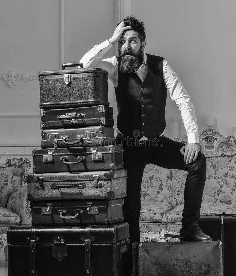 Man with Beard and Mustache Packed Luggage, White Interior Background ...