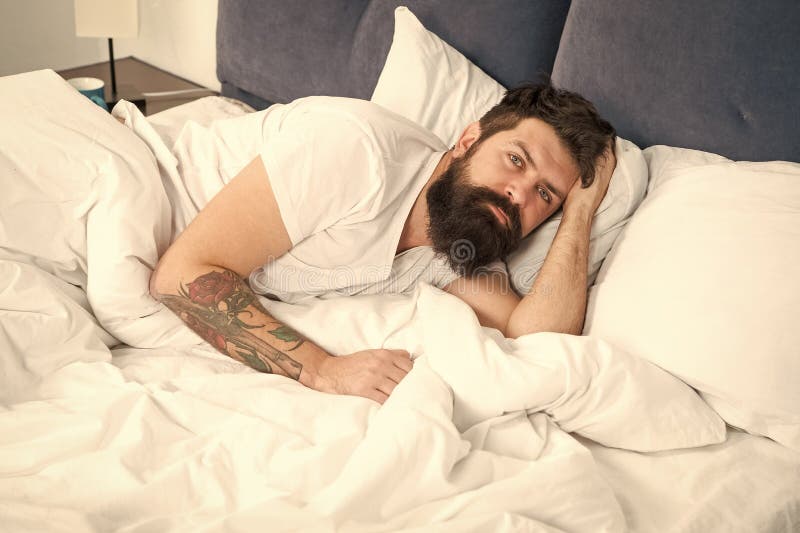 Man Bearded Hipster Having Problems with Sleep. Guy Lying in Bed Try To ...