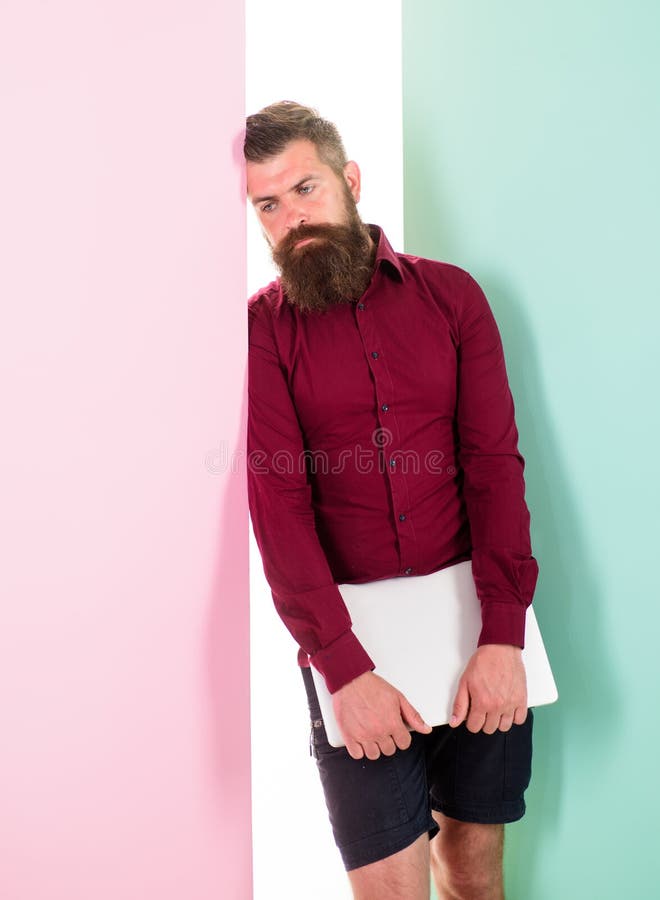 Man Bearded Hipster Worker with Laptop Lean on Wall. Guy Web Developer ...