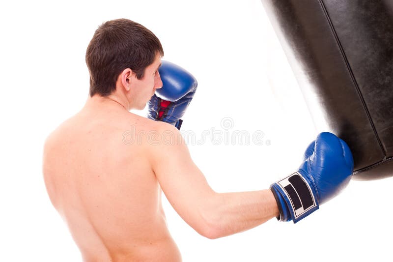 Man beats a boxing bag stock photo. Image of black, hand - 17393080