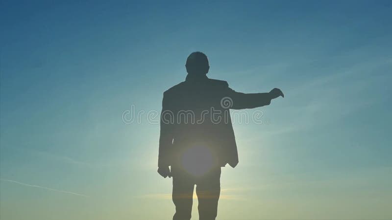 Man Becoming Transparent and Disappears Slow Motion Against Sun Stock ...