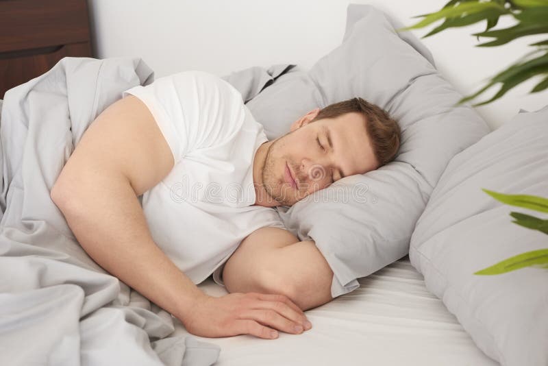 Man at the bed stock image. Image of enjoyment, dreaming - 87955955