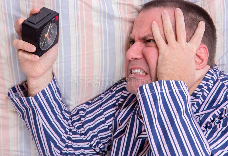 Man in Bed Watching Alarm Clock Stock Photo - Image of depressed, face ...