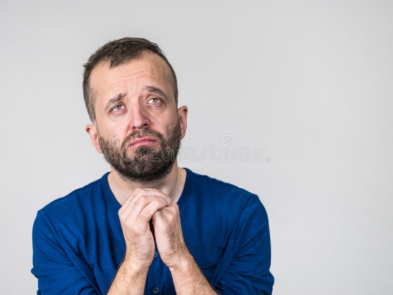 Man begging or apologizing stock photo. Image of mistake - 305600848