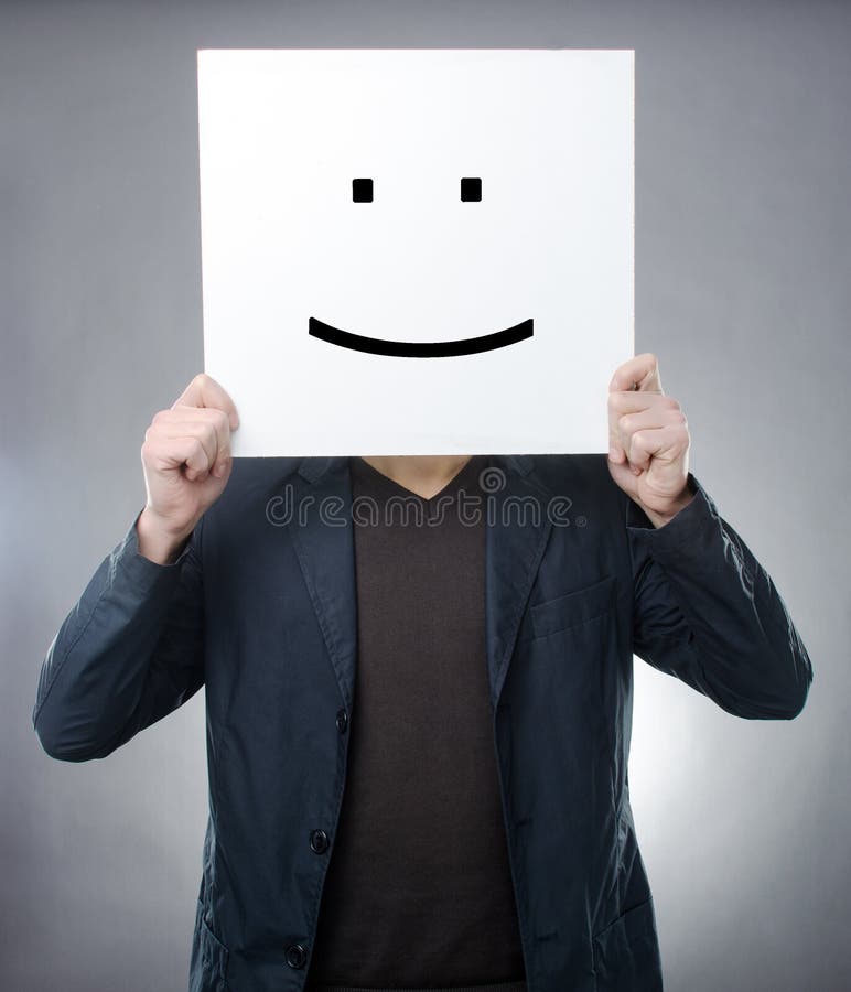 Man behind smiley symbol stock photo. Image of gray, background - 28133314
