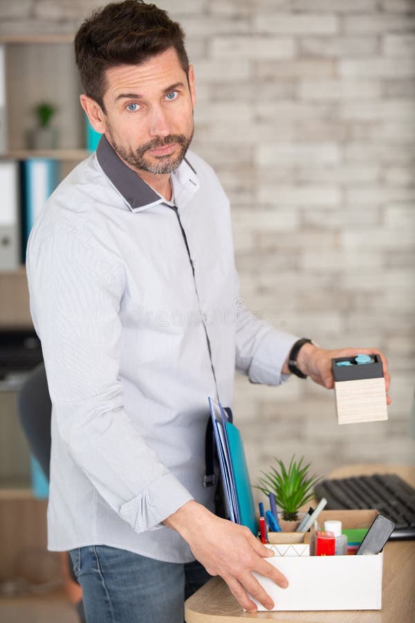 Man being fired from job stock image. Image of person - 268743343