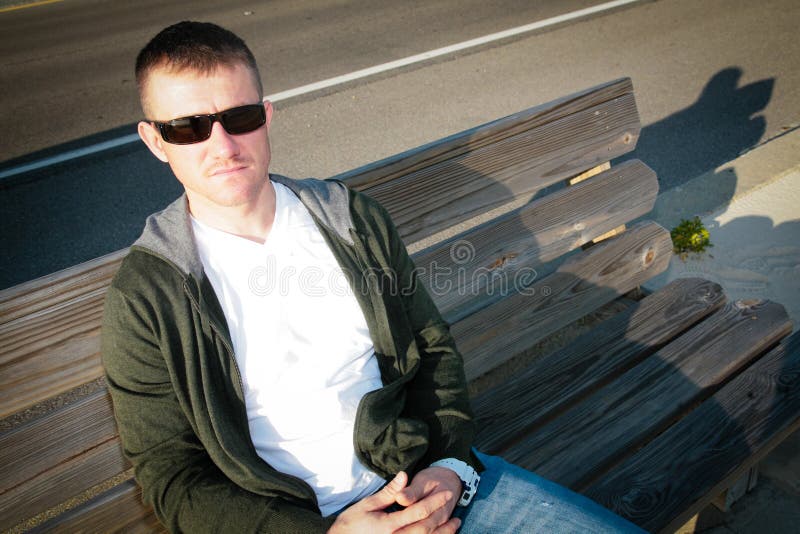 A Man on a Bench stock image. Image of emotional, person - 22743795