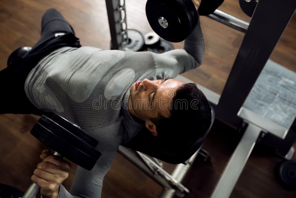 Man during Bench Press Exercise Stock Image - Image of muscular, human ...