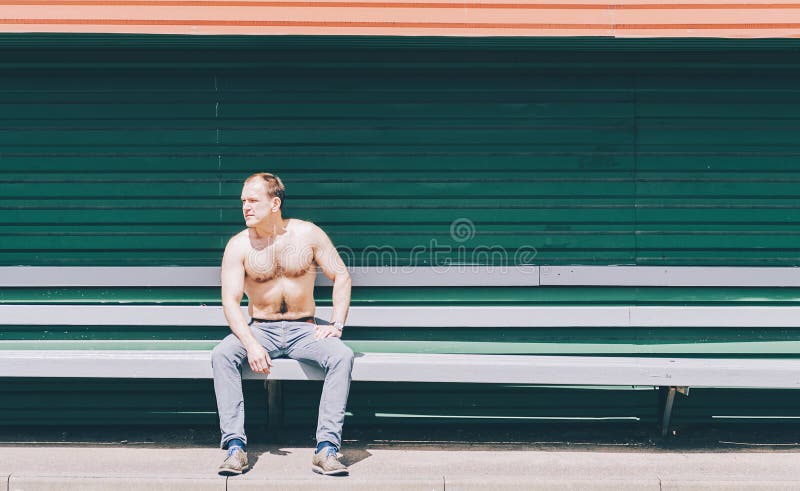 Man on Bench stock photo. Image of outdoor, outdoors - 104375560