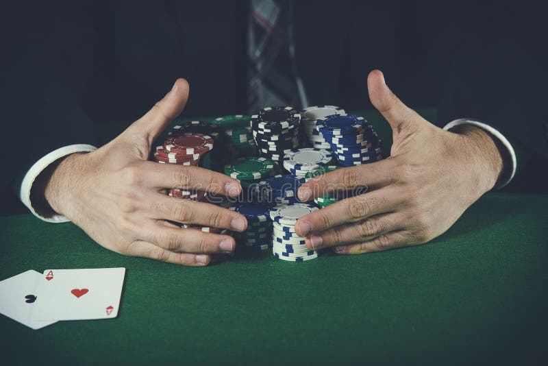 Man betting on the casino stock image. Image of hand - 57242471