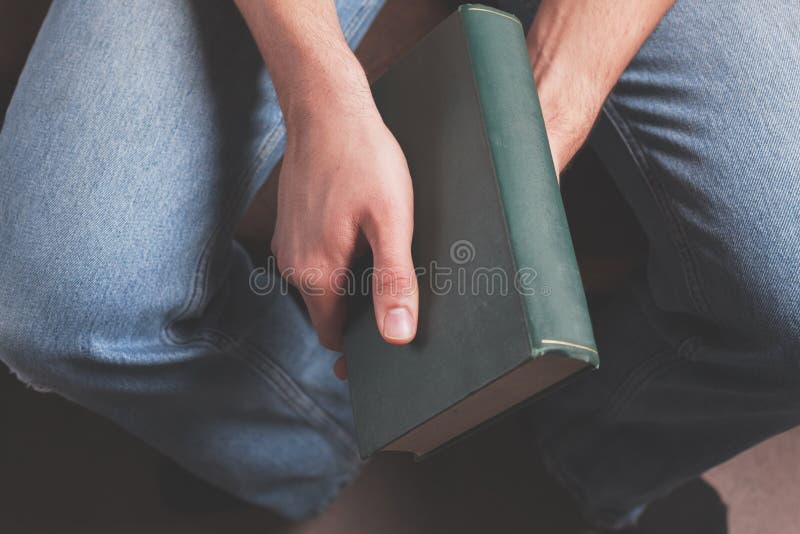 Man with big old book stock photo. Image of young, adult - 47305724