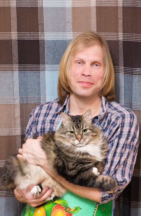 Man and big striped cat stock photo. Image of green, pals - 19321724