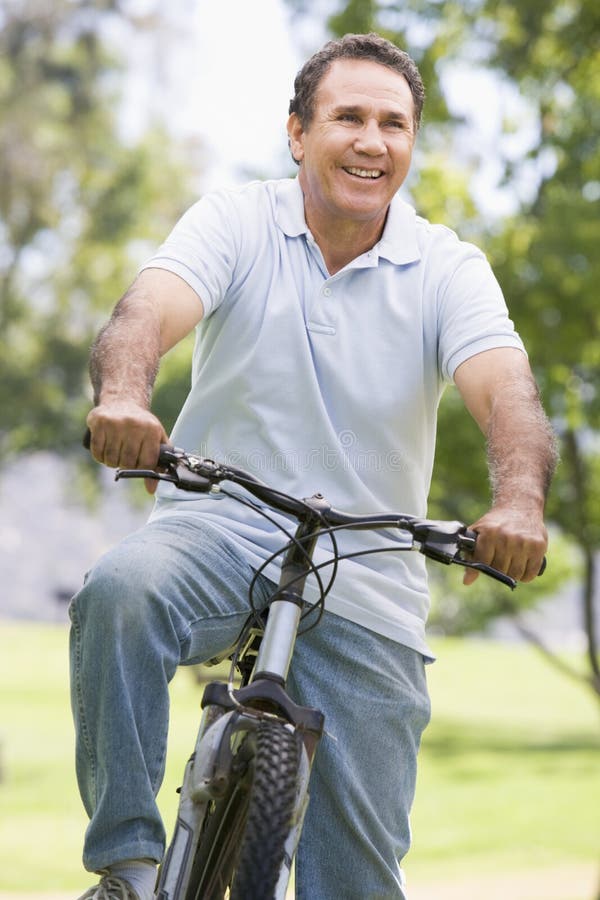Asian Man Riding Bike in Park Stock Image - Image of casual, ethnicity ...