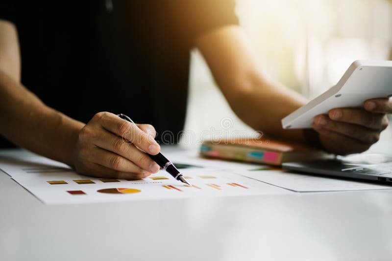 Man with Bills and Calculator. Man Using Calculator To Calculate Bills ...
