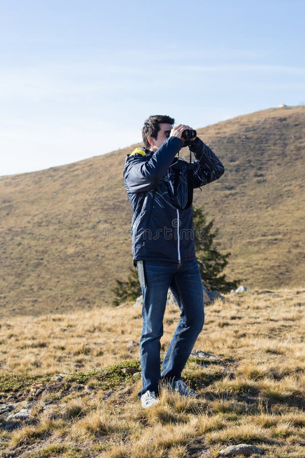 Man with binoculars stock photo. Image of time, binoculars - 34974102