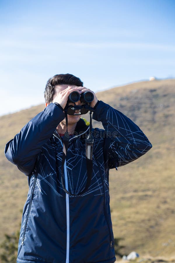 Man with binoculars stock image. Image of adventurer - 34974103