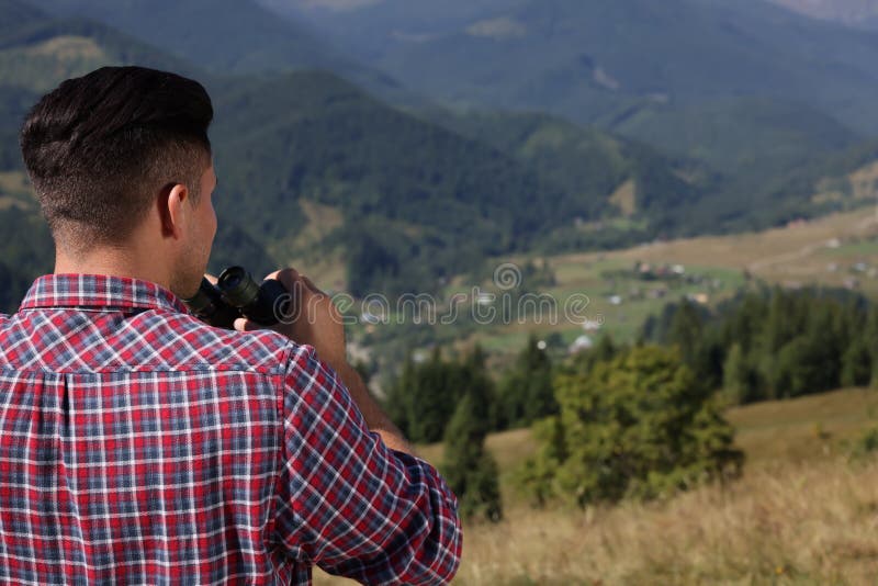 Back View Man Looking Binoculars Stock Photos - Free & Royalty-Free ...