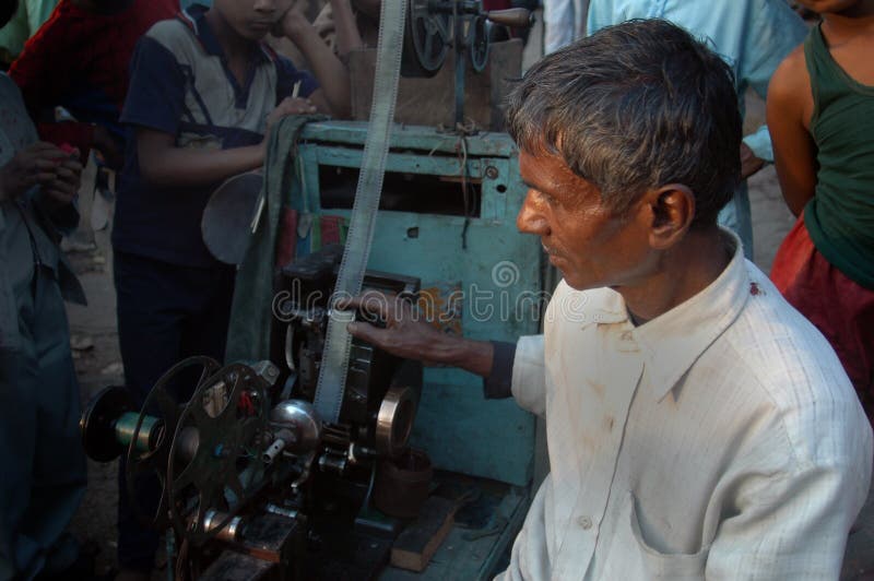 Man with a bioscope editorial stock image. Image of male - 20376034