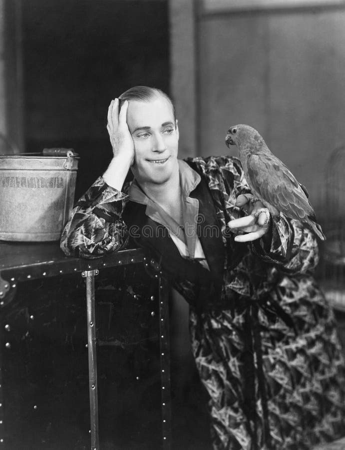 Man with Bird Perched on Finger Stock Image - Image of adults, birds ...