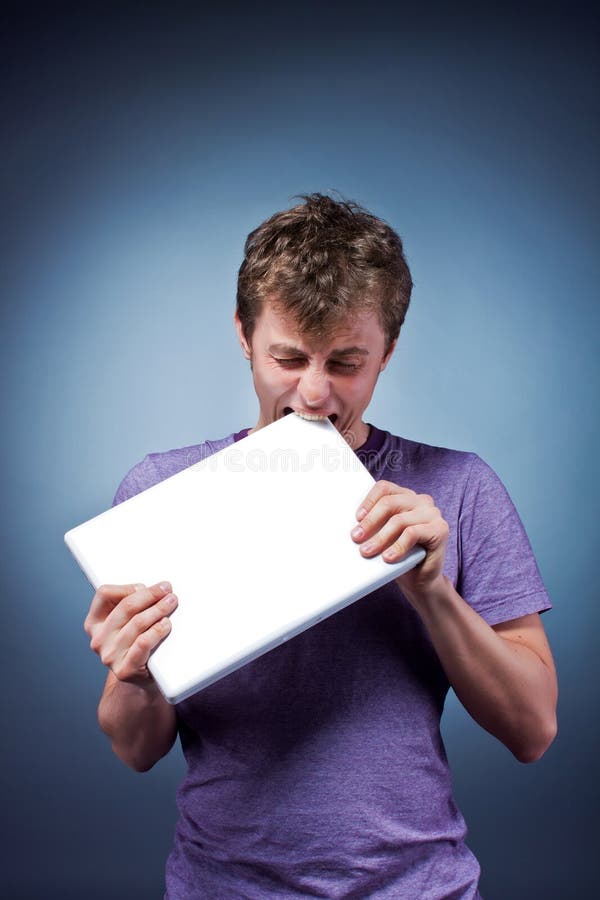 Man bite laptop stock image. Image of vertical, white - 19816181