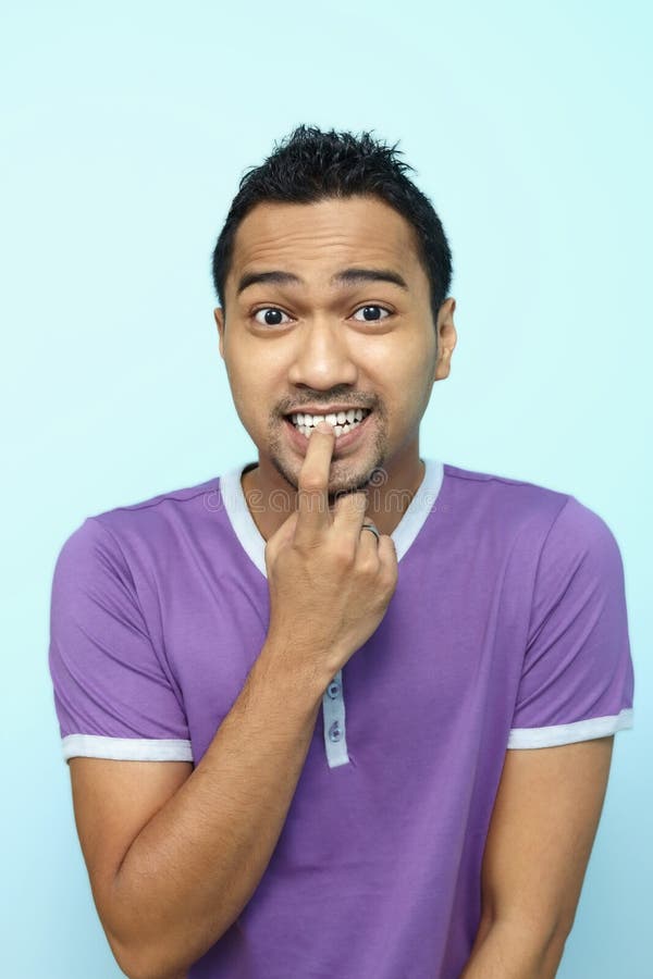 Man Biting His Finger. Conceptual Image Stock Image - Image of finger ...