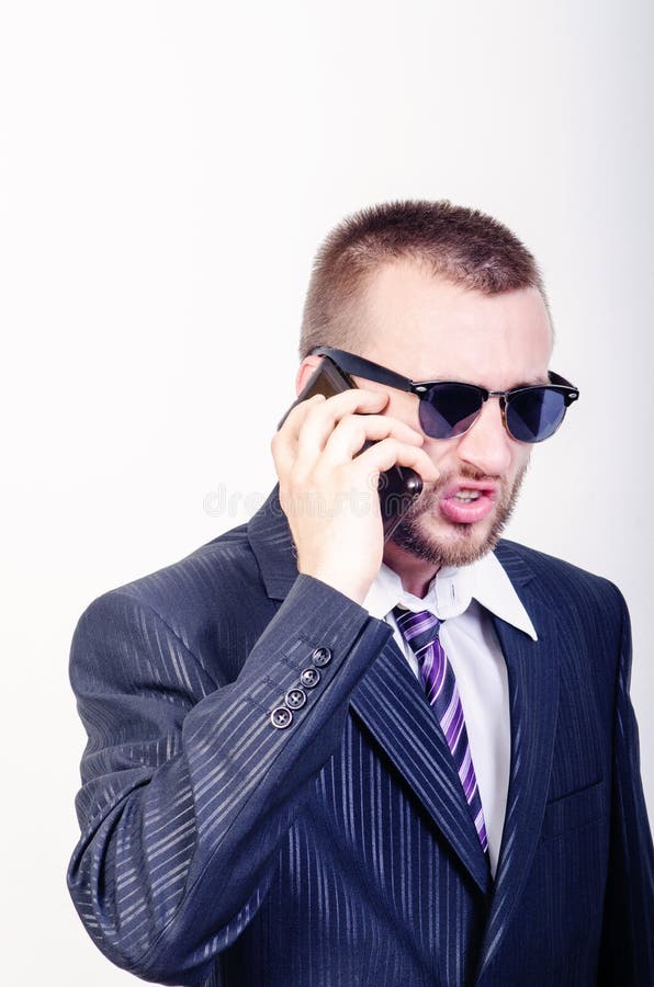 Angry man with phone stock photo. Image of expression - 100418834