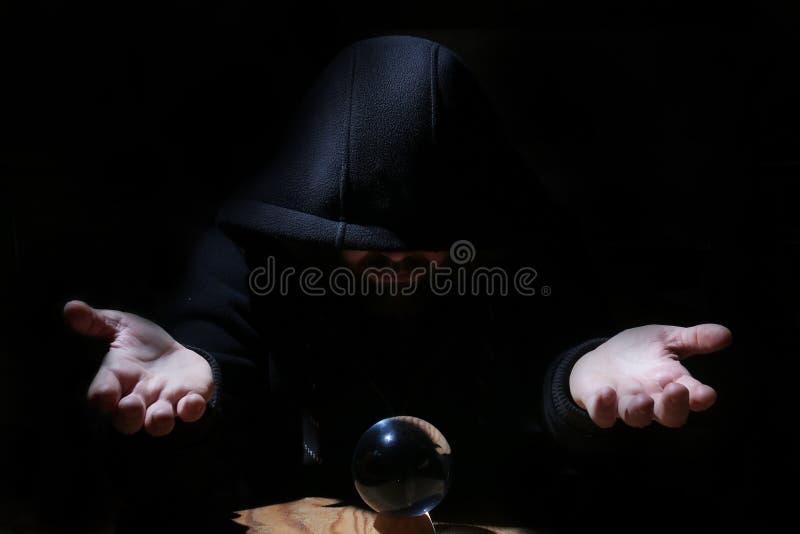 Man in a Black Hood with Cristal Ball Stock Image - Image of model ...