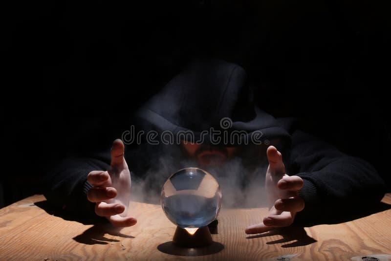 Man in a Black Hood with Cristal Ball Stock Photo - Image of holiday ...