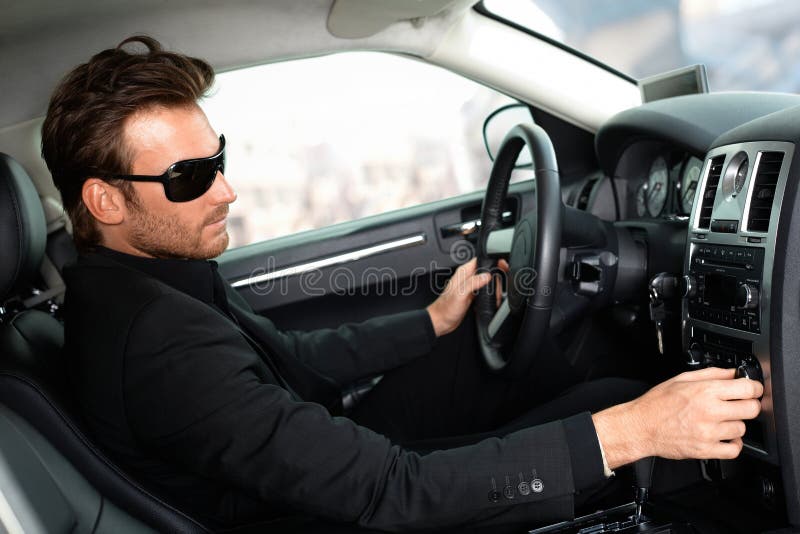 Elegant man in luxury car stock photo. Image of elegance - 22953736