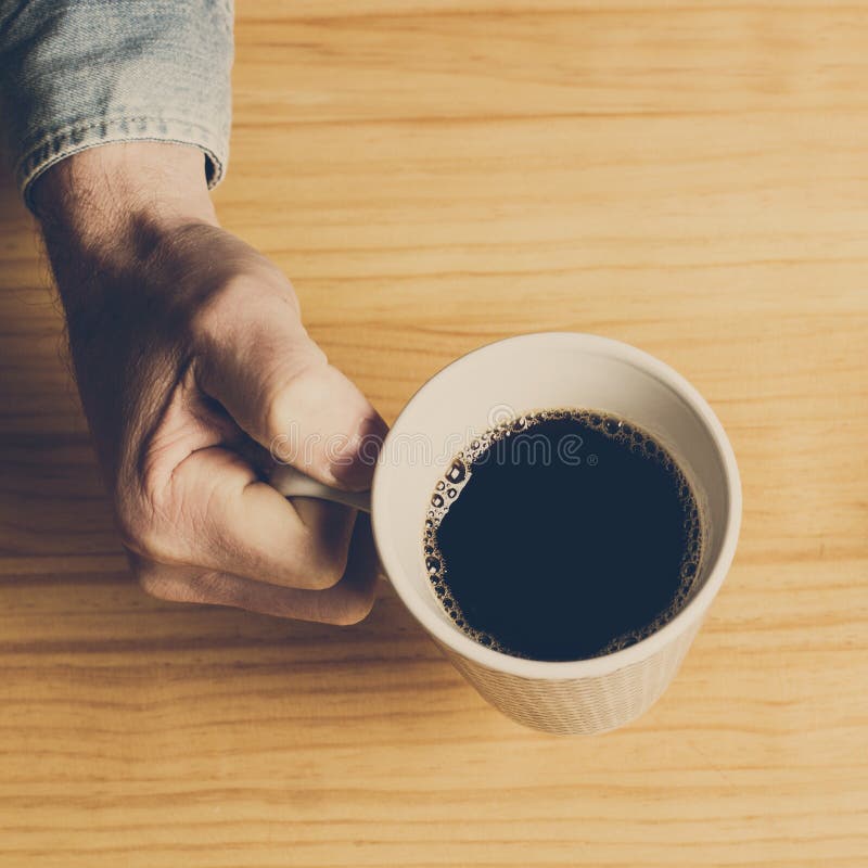 A Man with a Cup of Coffe in His Hand Stock Photo - Image of view ...