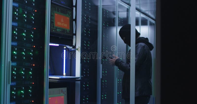 Black Man Hacking Computer System in Server Room Stock Footage - Video ...