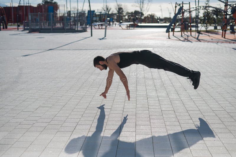 Strong Man Doing Jumping Push Ups Stock Photos - Free & Royalty-Free ...