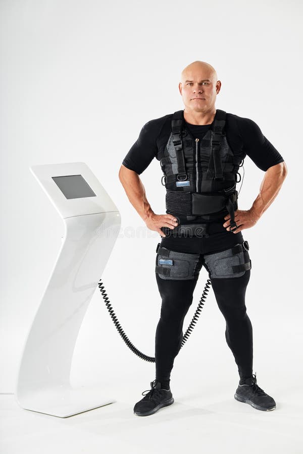 Man in Black Suit for Ems Training Standing with Hands on the Hips ...