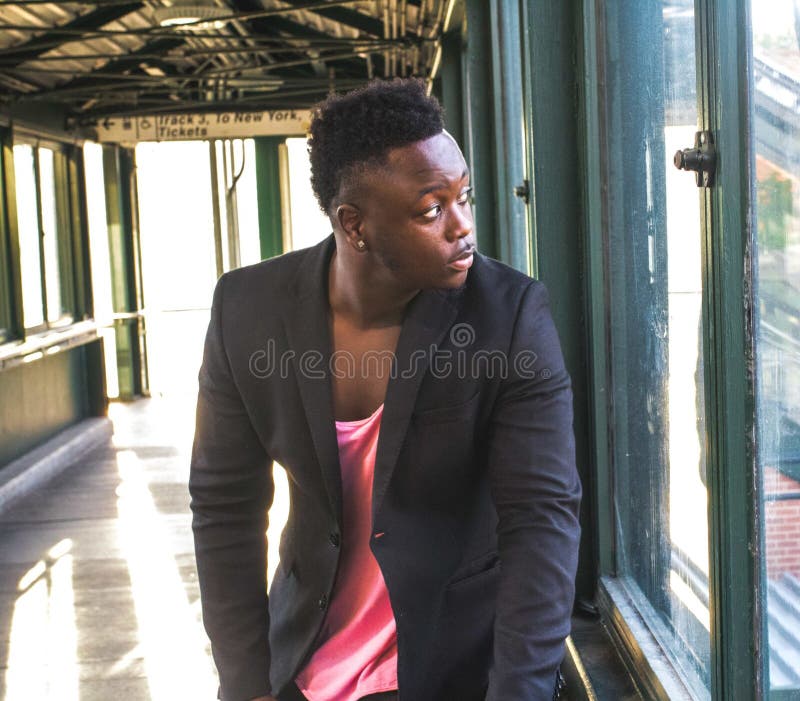 Man in Black Suit Looking Outside of a Window Stock Image - Image of ...