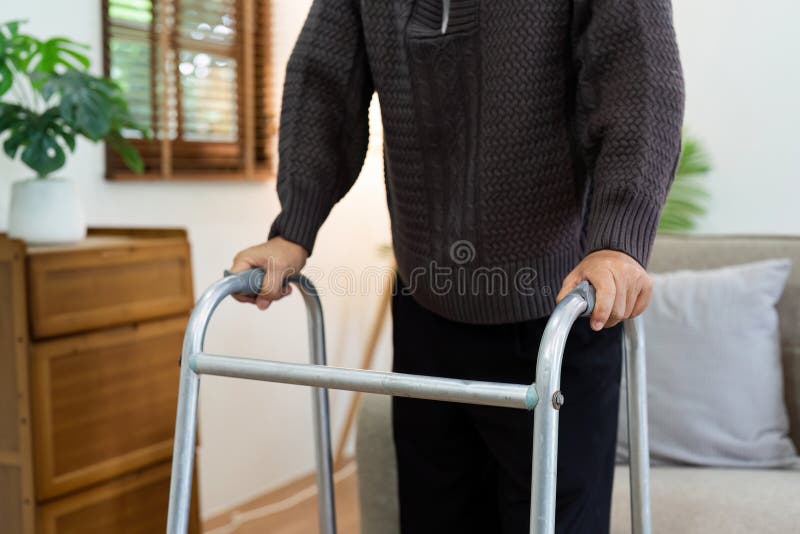 A Person is Holding a Walker with a Hand on the Handle. Healthcare ...