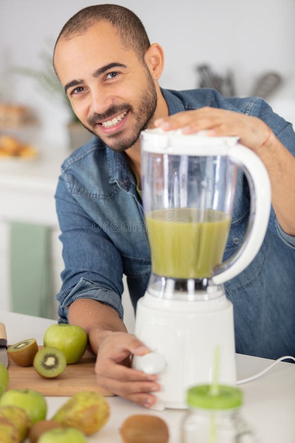 Man with Blender Making Smoothie from Kiwis Stock Image - Image of ...