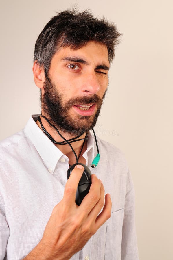 Man Blinking His Eyes and Playing with Mouse Stock Photo - Image of ...
