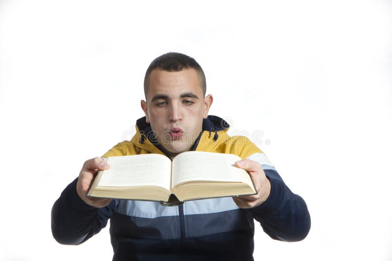 Mature Man Blowing Dust Off an Old Book Stock Image - Image of ...