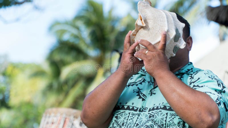 Man Blowing a Conch Shell on Occasion of Ganesh Chaturthi. Man Blow ...
