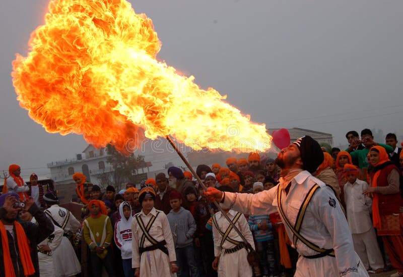 Man blowing fire editorial photo. Image of women, followers - 17802816