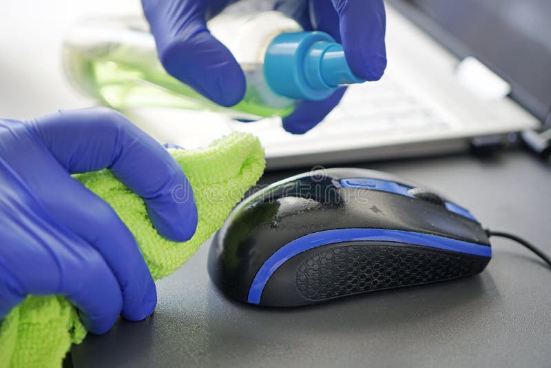 A Man in Blue Gloves Wipes Dirty Mouse with a Rag. Cleaning Computer ...