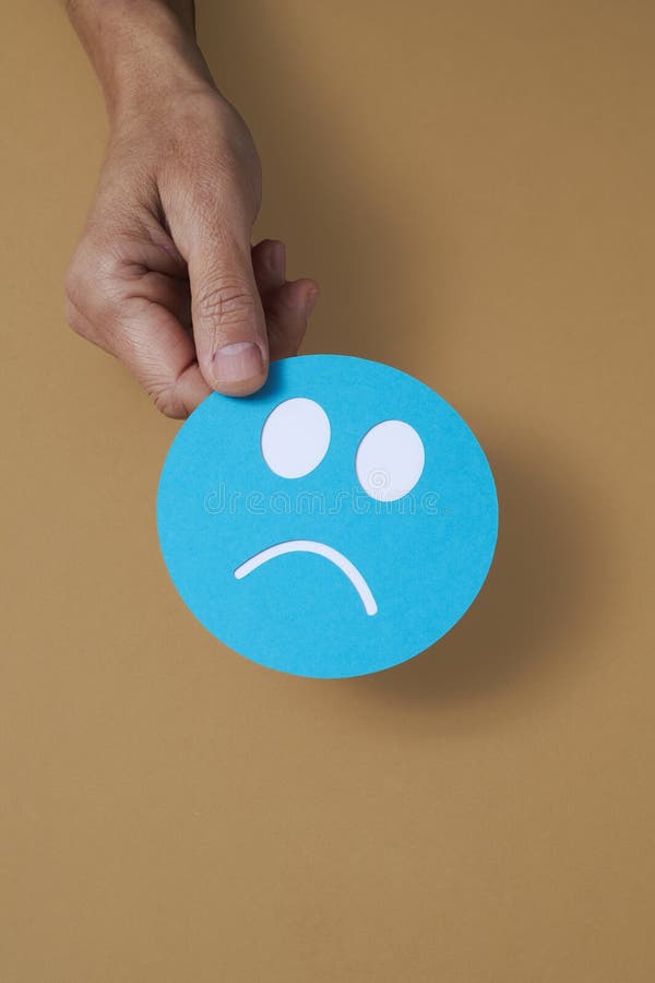 Man with a Blue Sad Face in His Hand Stock Photo - Image of homemade ...