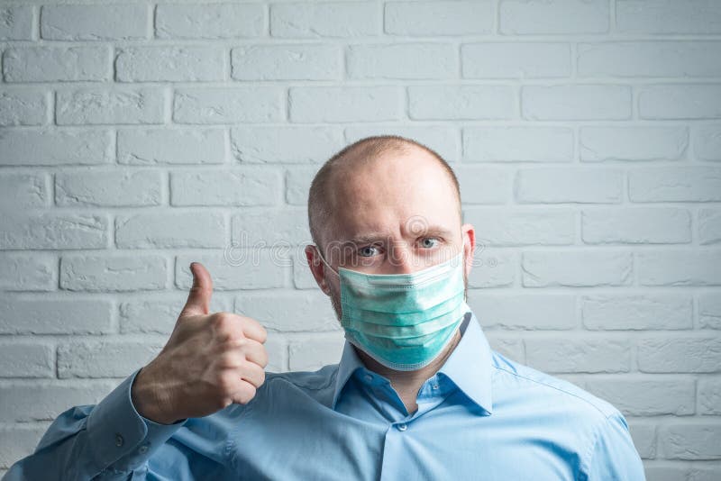 Man in Blue Shirt in Virus Mask on White Stock Photo - Image of ...