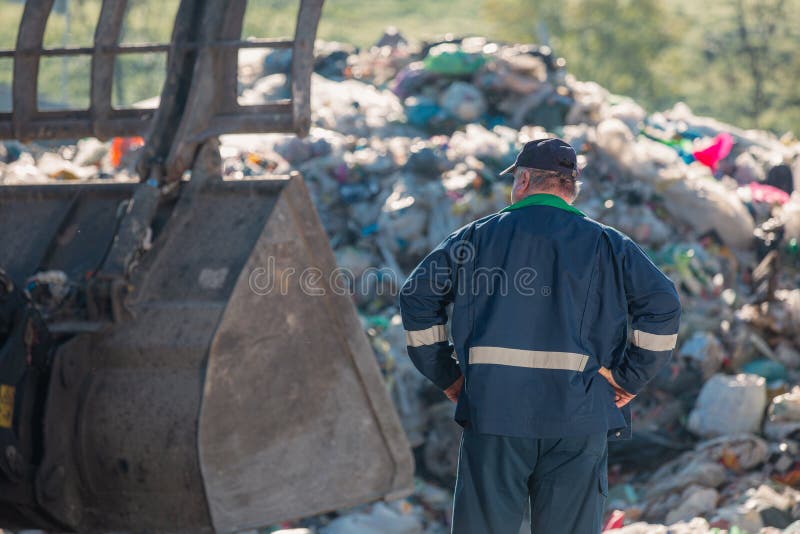 Man Looking at Garbage at Landfill Stock Image - Image of conservation ...