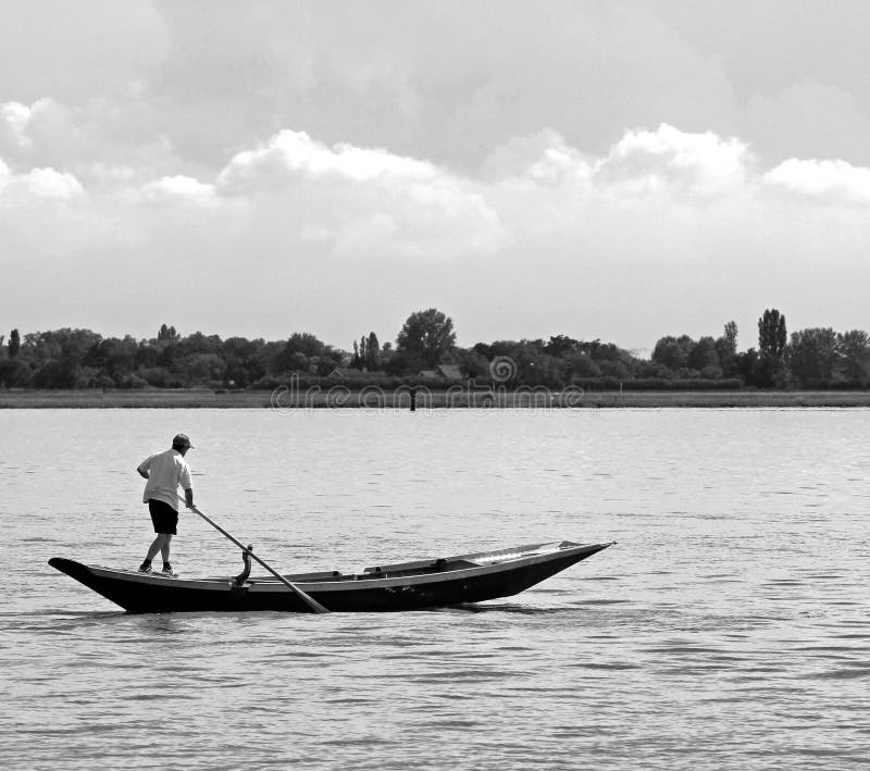 Man Boat in the Lagoon of Venice Stock Image - Image of boat, veneto ...