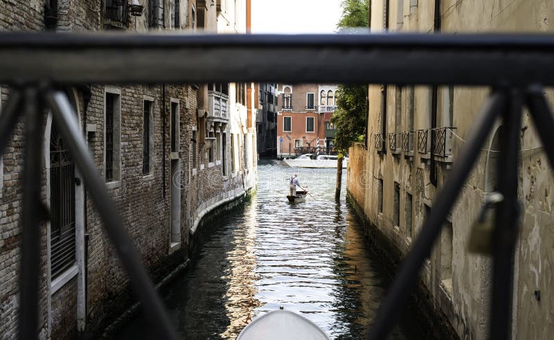 Man on a boat in Venice editorial image. Image of city - 42047165
