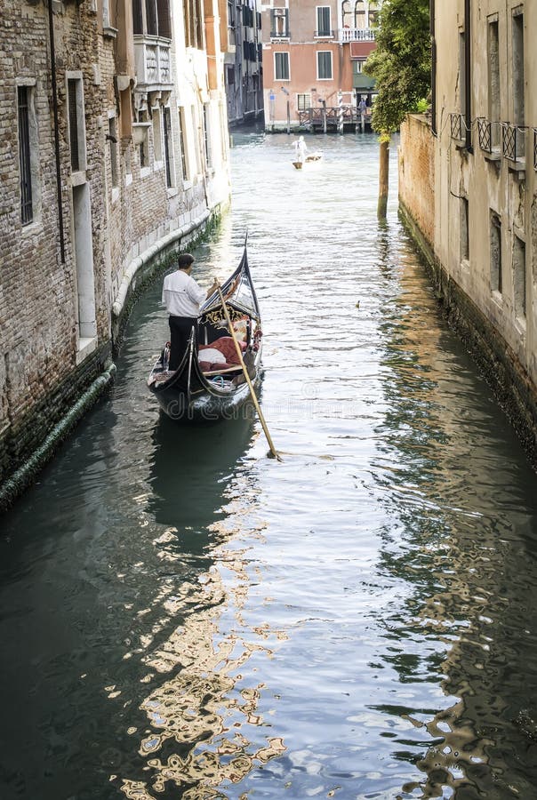 Man on a boat in Venice editorial photography. Image of italy - 42047122