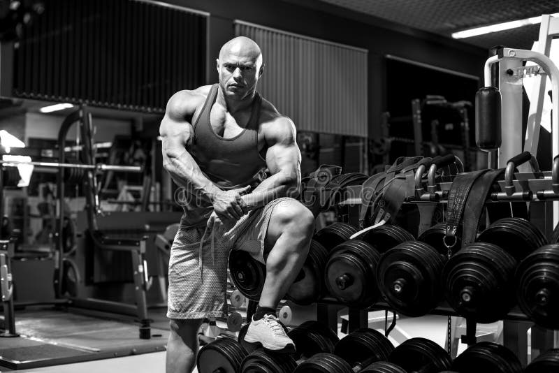 Man bodybuilder in GYM stock photo. Image of caucasian - 151412244
