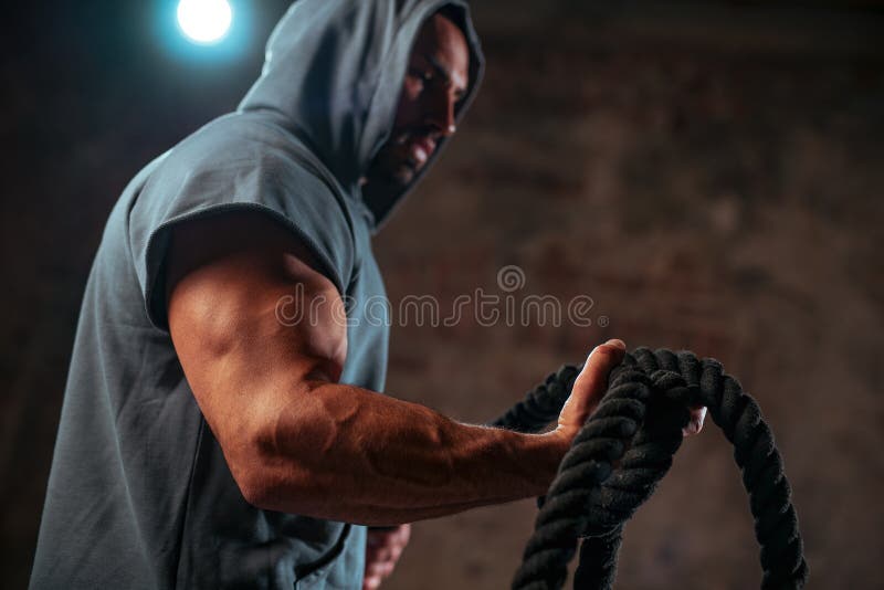 Man Bodybuilder Holds the Rope Stock Photo - Image of athlete, healthy ...
