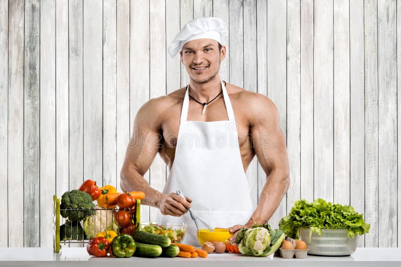 Man bodybuilder on kitchen stock photo. Image of nourishment - 133341186